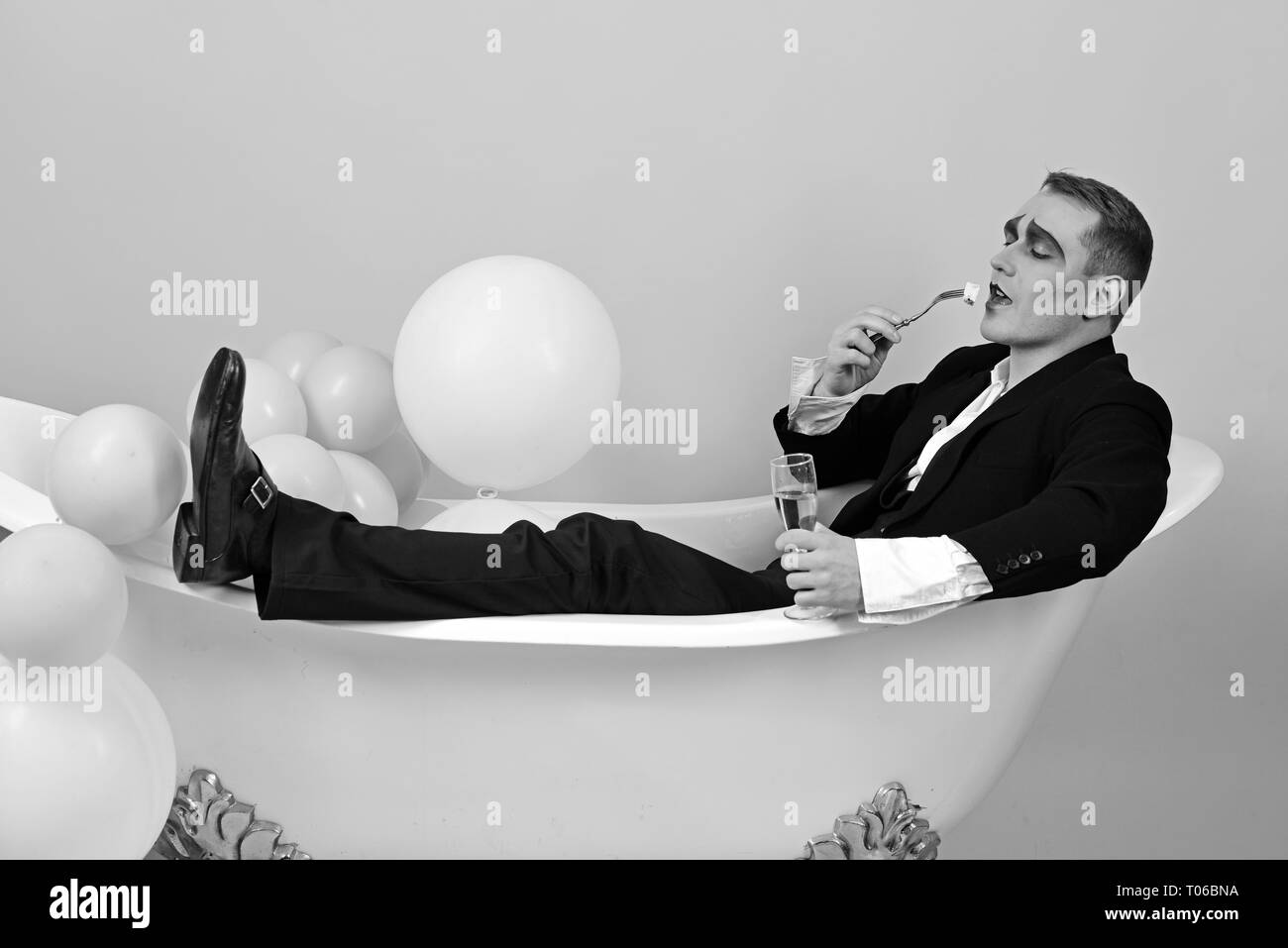Happy bubble bath day. Mime actor enjoy bathing in bath tub. Mime man ...
