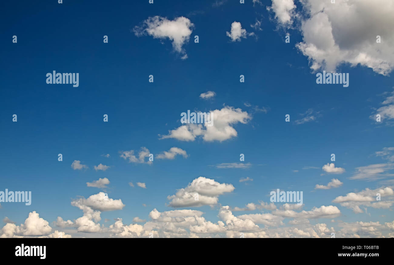 Summer blue sky and small clouds background hi-res stock photography ...