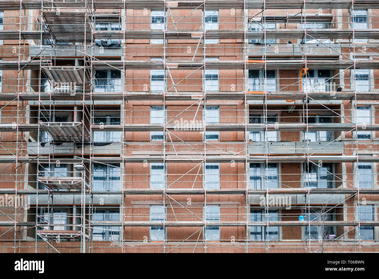 building construction site , scaffold on house facade Stock Photo - Alamy