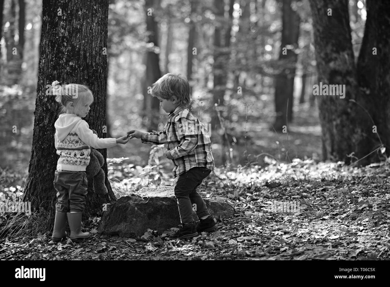 Little boy and girl friends camping in woods. Childhood and child ...
