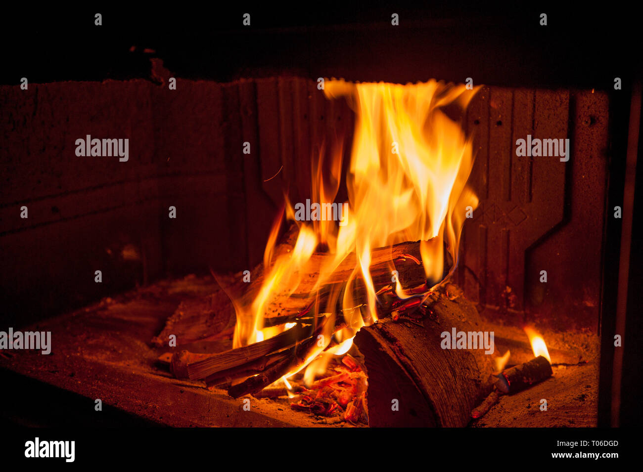 flame in the lit fireplace Stock Photo - Alamy