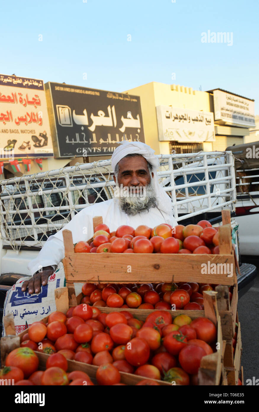 Man selling tomatoes hi-res stock photography and images - Alamy