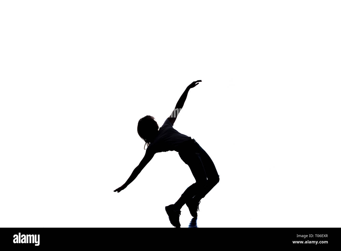 Dancer jumping on white background Stock Photo - Alamy