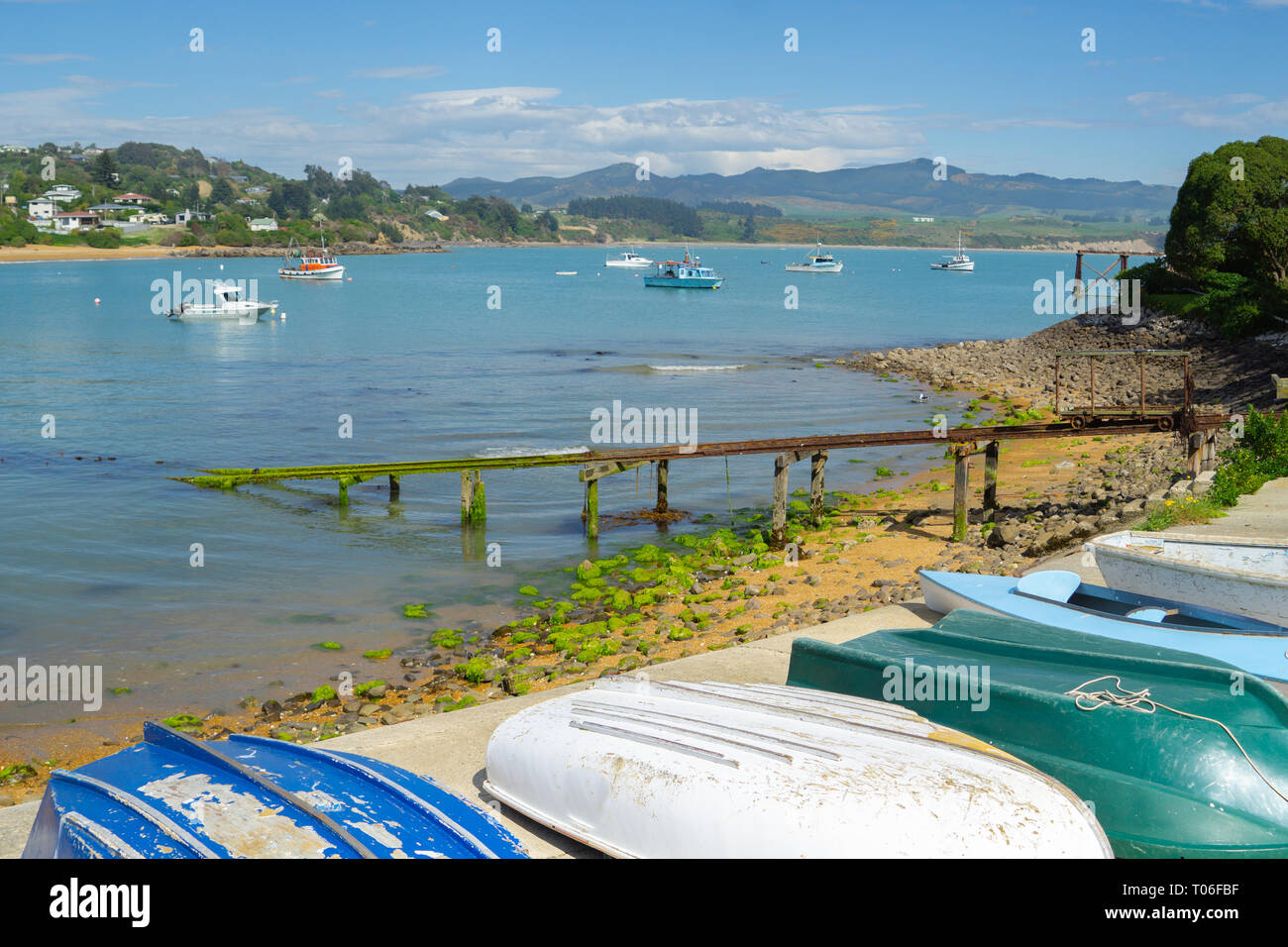 South Island New Zealand fishing village of Moeraki, boats and slipways ...