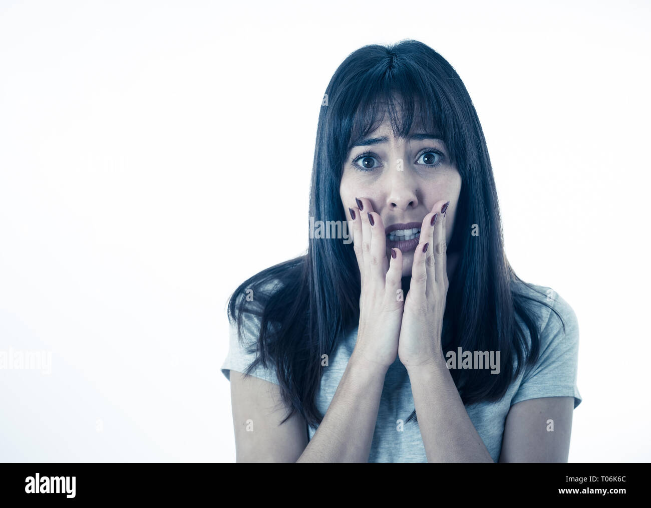 Close up of young woman feeling scared and shocked making fear, anxiety ...