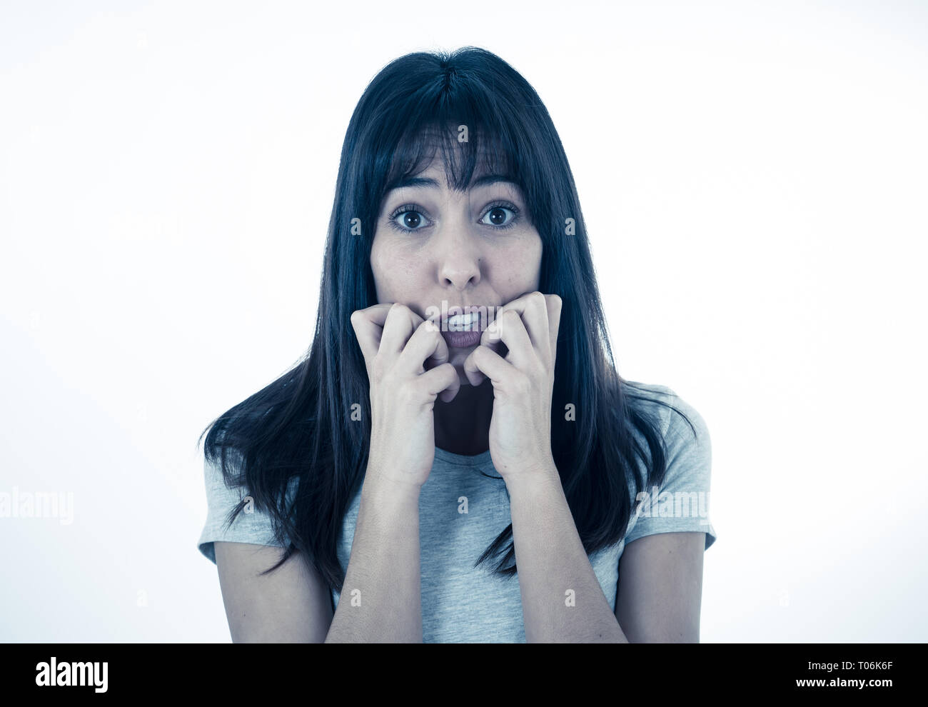 Close up of young woman feeling scared and shocked making fear, anxiety ...