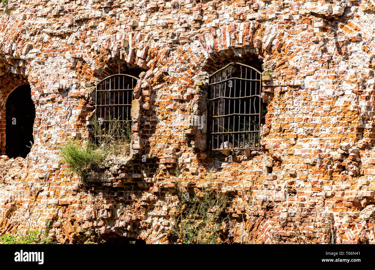 Ruins of the ancient Oreshek fortress. Windows with forged lattice at ...