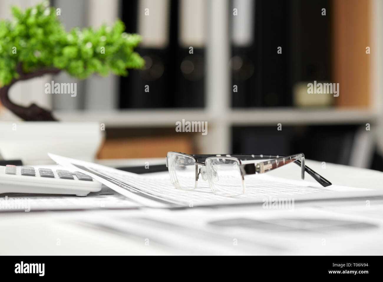Office interior, closeup table with reports. Business financial ...