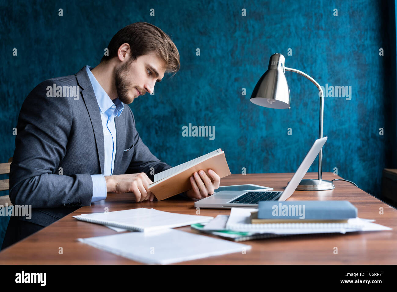 Young man working on spreadsheet hi-res stock photography and images ...