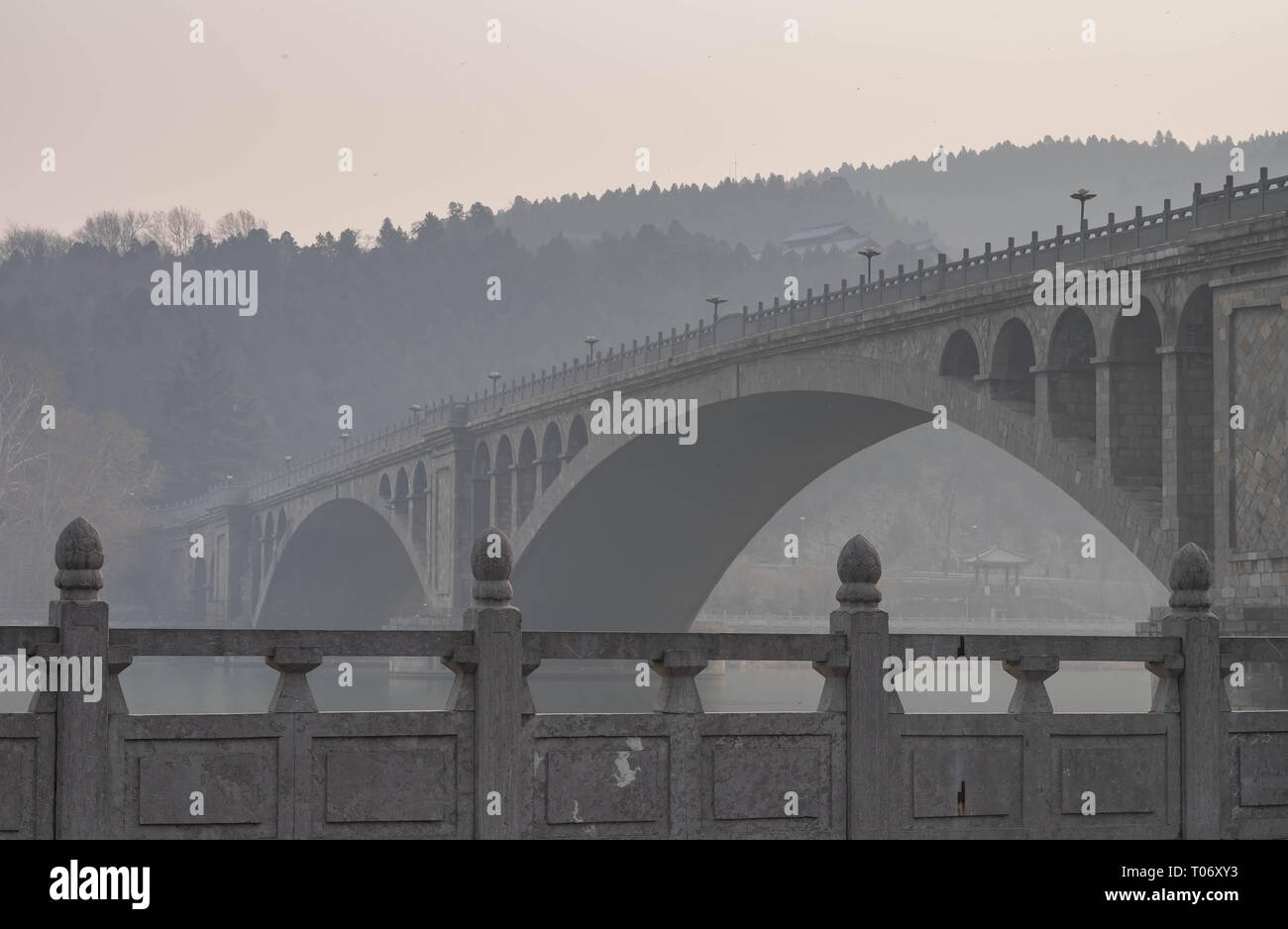 The walk way along and the bridge with the Chinese style at the Longmen ...