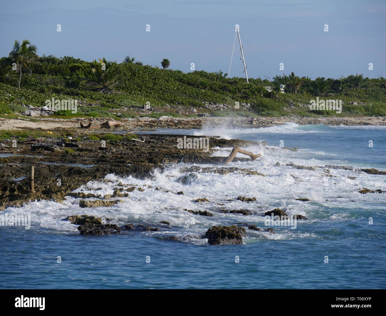 Beautiful view of foaming waves breaking out against the rocky shore of ...