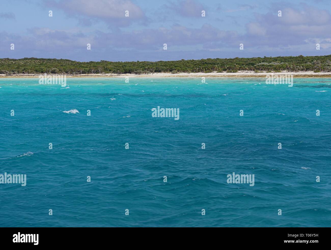 Different hues of blue waters with a beautiful island in the islands of ...