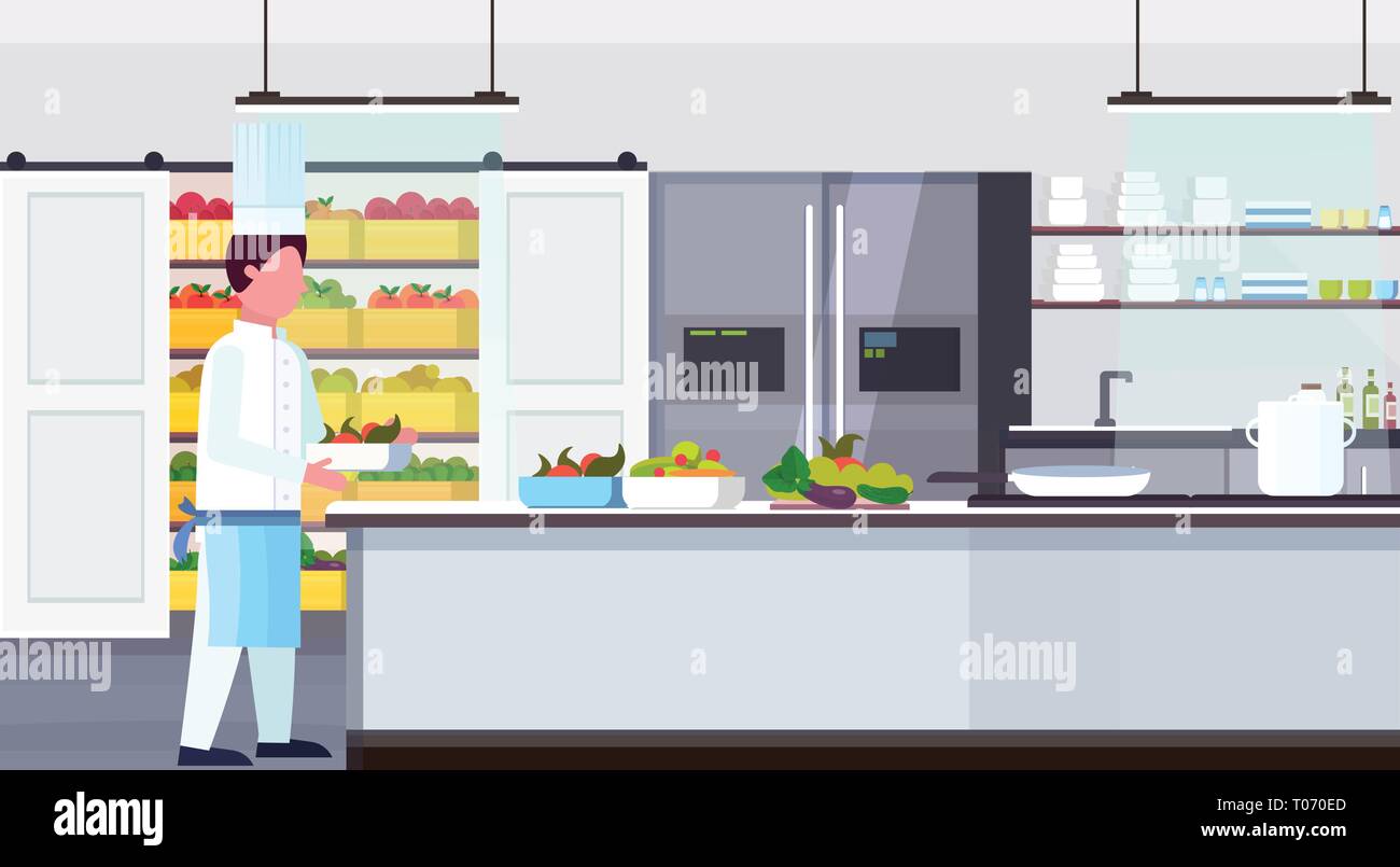 chef cook carrying plate with fresh fruits vegetables meal ingredients ...