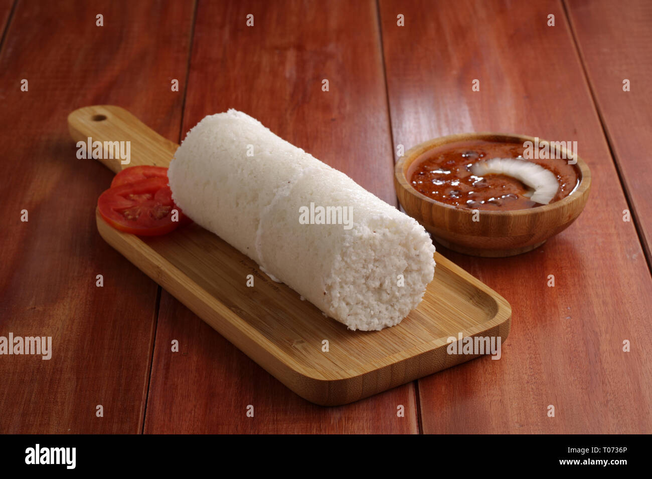 Kerala white rice puttu with wooden BG Stock Photo - Alamy