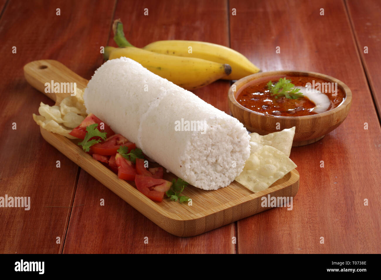 Kerala white rice puttu with wooden BG Stock Photo - Alamy