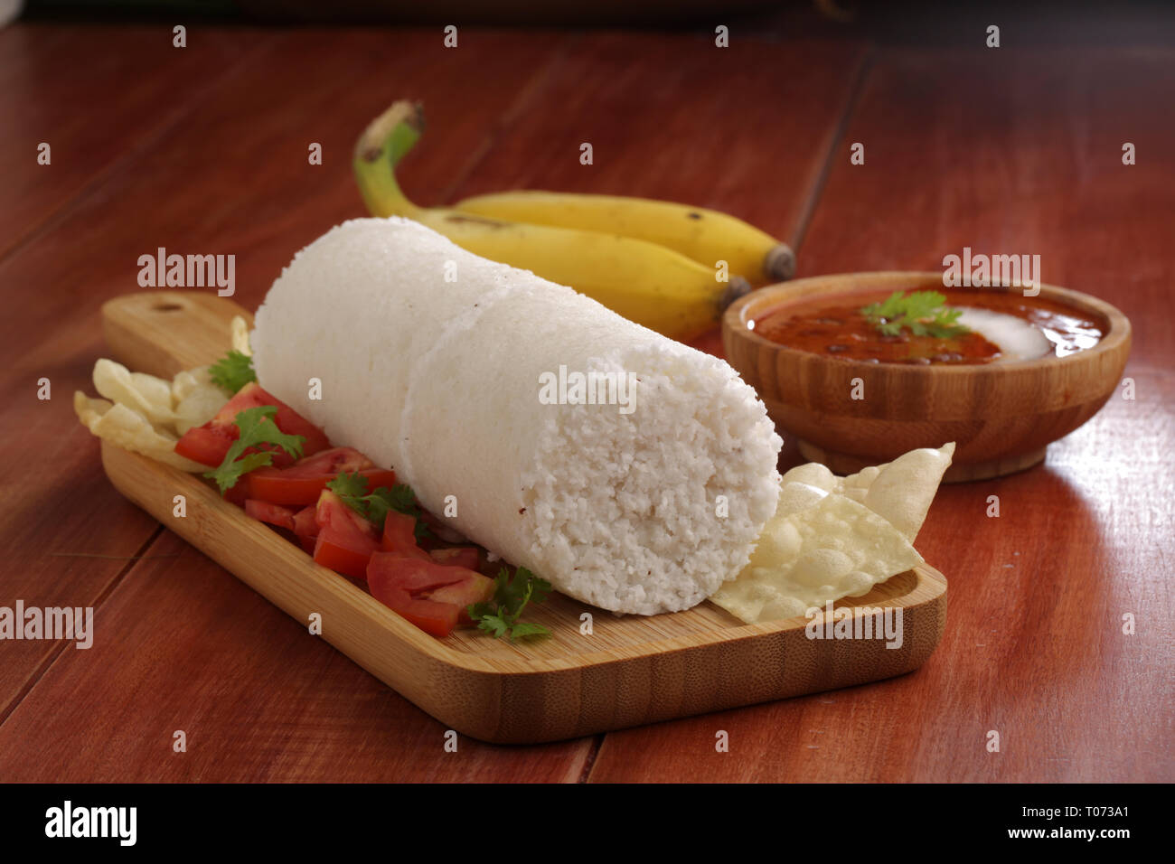 Kerala white rice puttu with wooden BG Stock Photo - Alamy