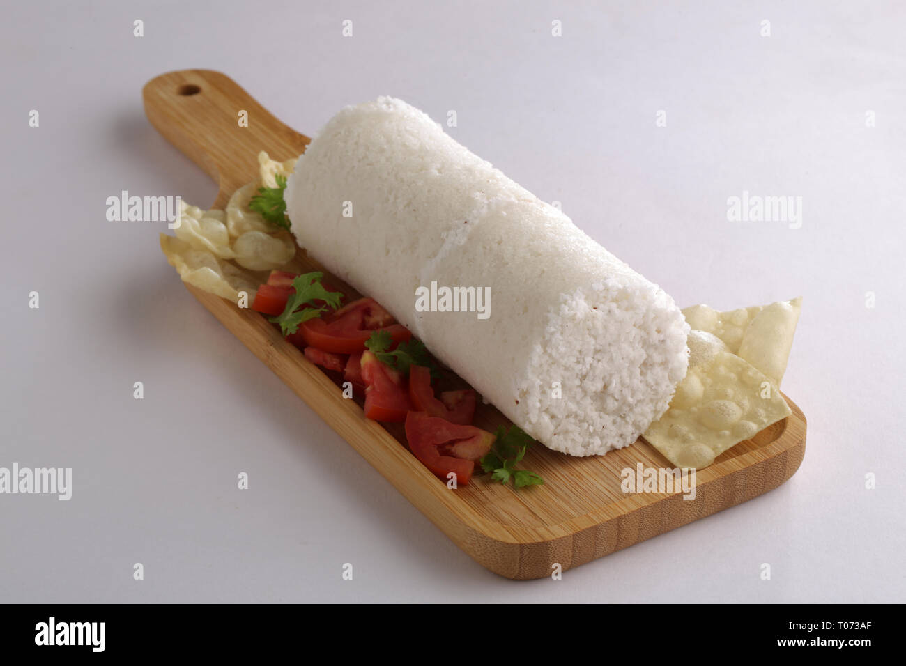 Kerala white rice puttu with wooden BG Stock Photo - Alamy