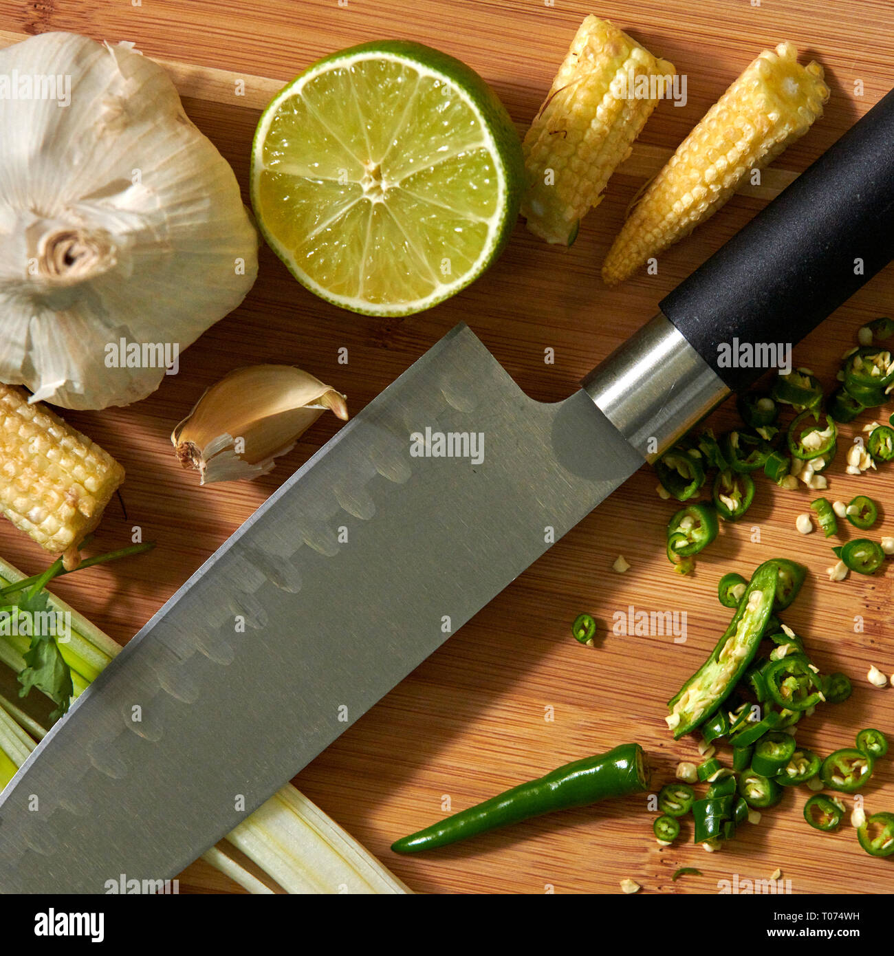 Asian Thai chillis and Vegetables for ingredients on chopping board ...