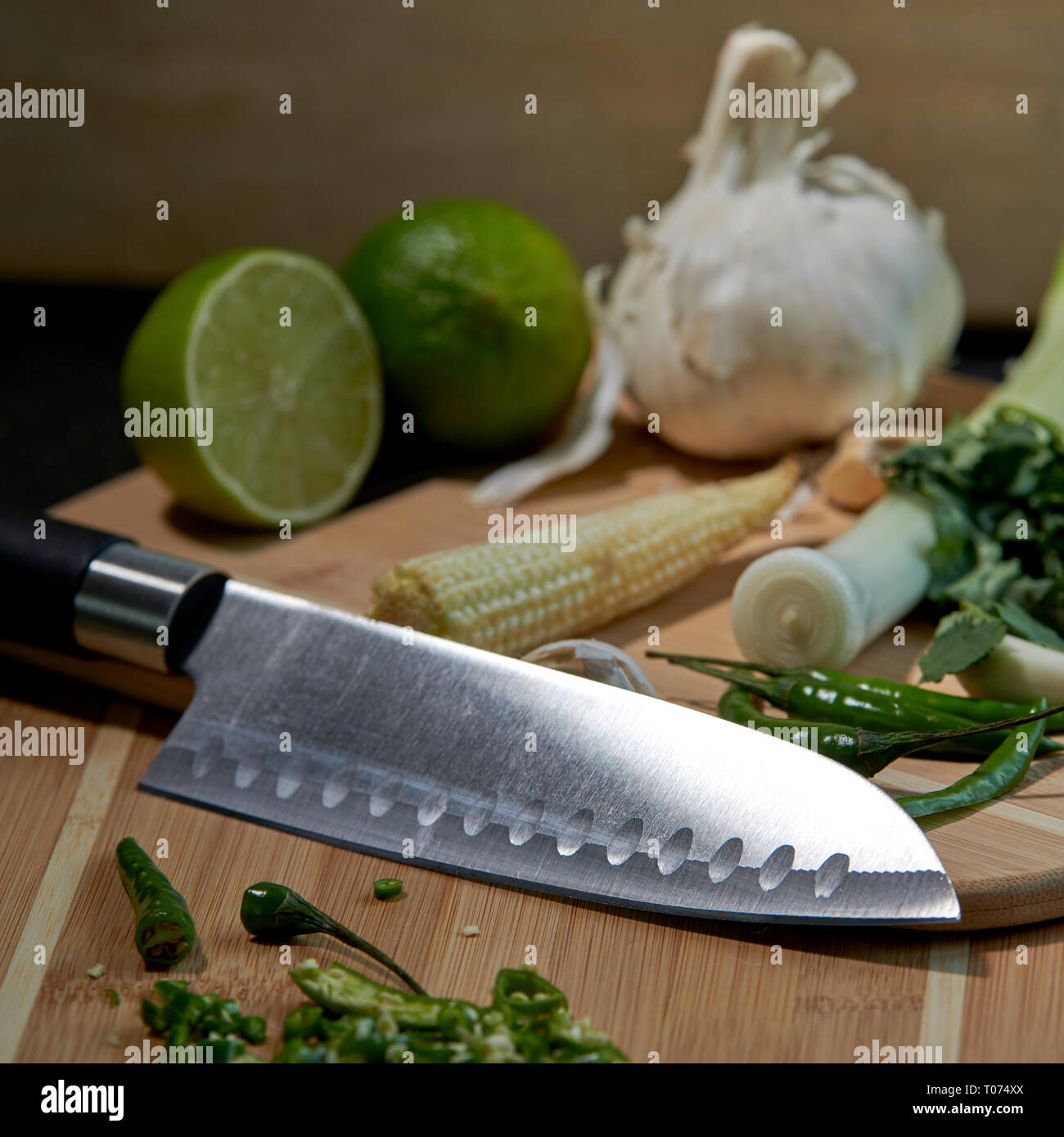Asian Thai chillis and Vegetables for ingredients on chopping board ...