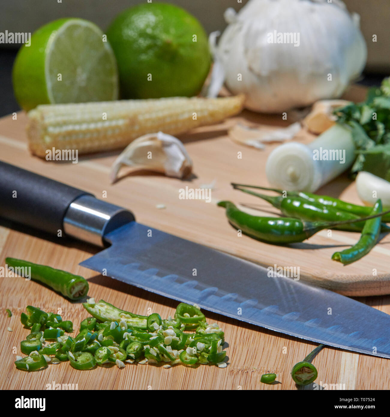 Asian Thai chillis and Vegetables for ingredients on chopping board ...
