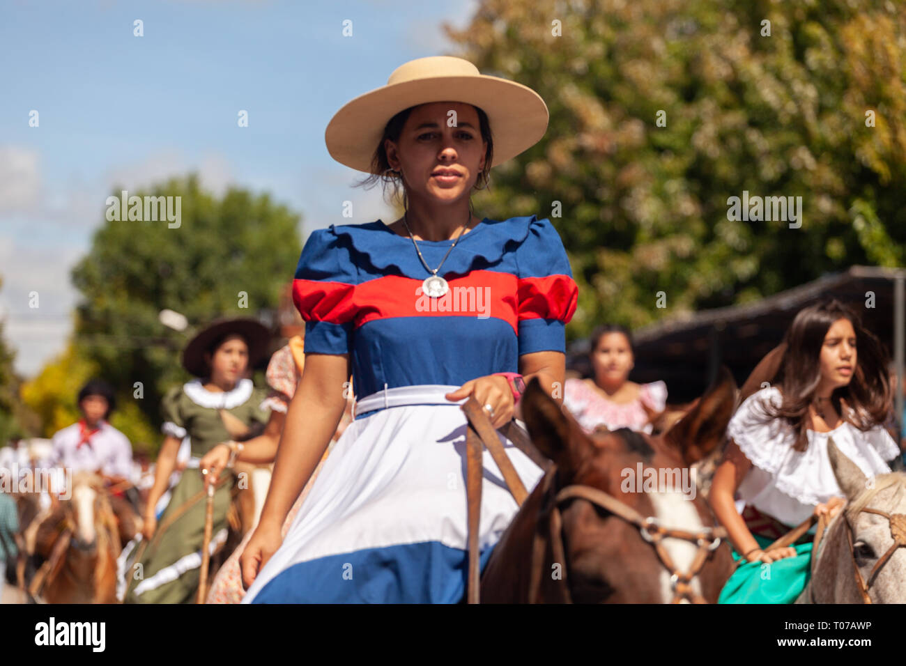 A woman seen riding her horse and wearing traditional costumes during ...