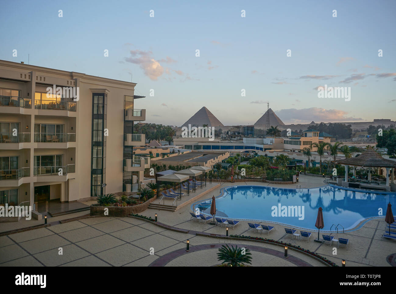 Giza, Egypt: View of the Khufu pyramid complex from the courtyard of a ...