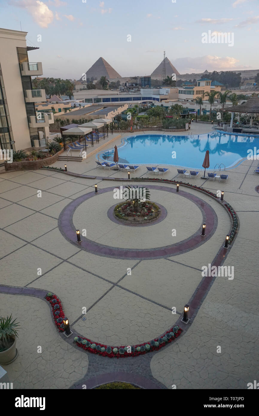 Giza, Egypt: View of the Khufu pyramid complex from the courtyard of a ...
