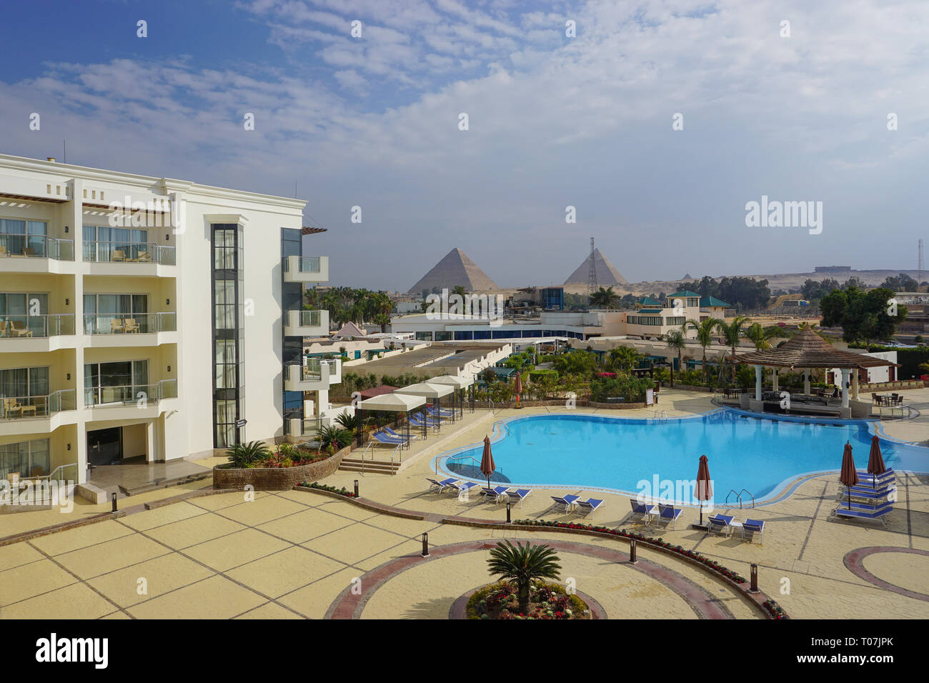 Giza, Egypt: View of the Khufu pyramid complex from the courtyard of a ...