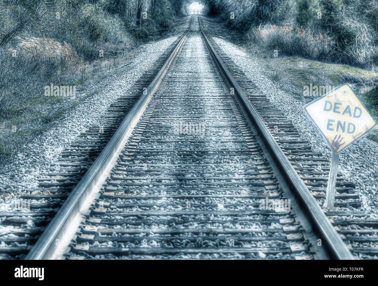 dark and scary railway track with dead end sign in front Stock Photo ...