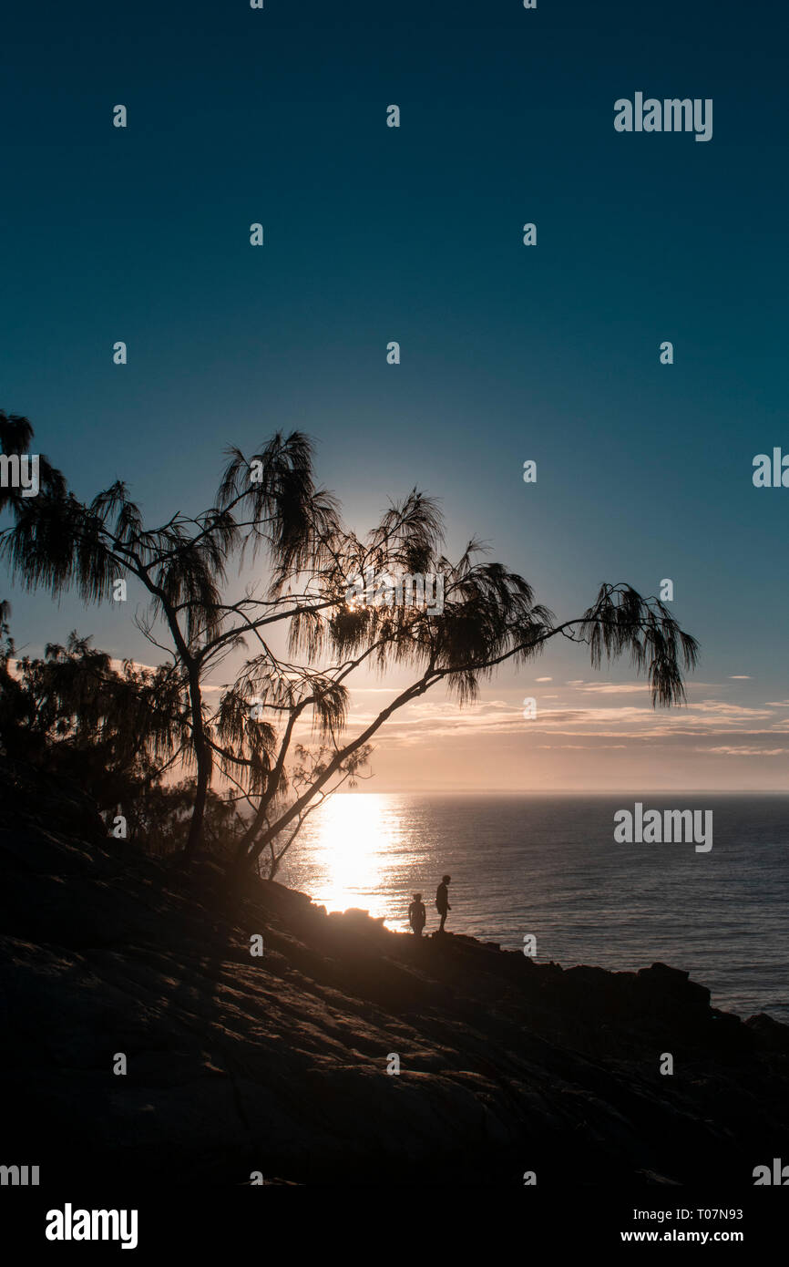 Watching sunset friends on beach hi-res stock photography and images ...