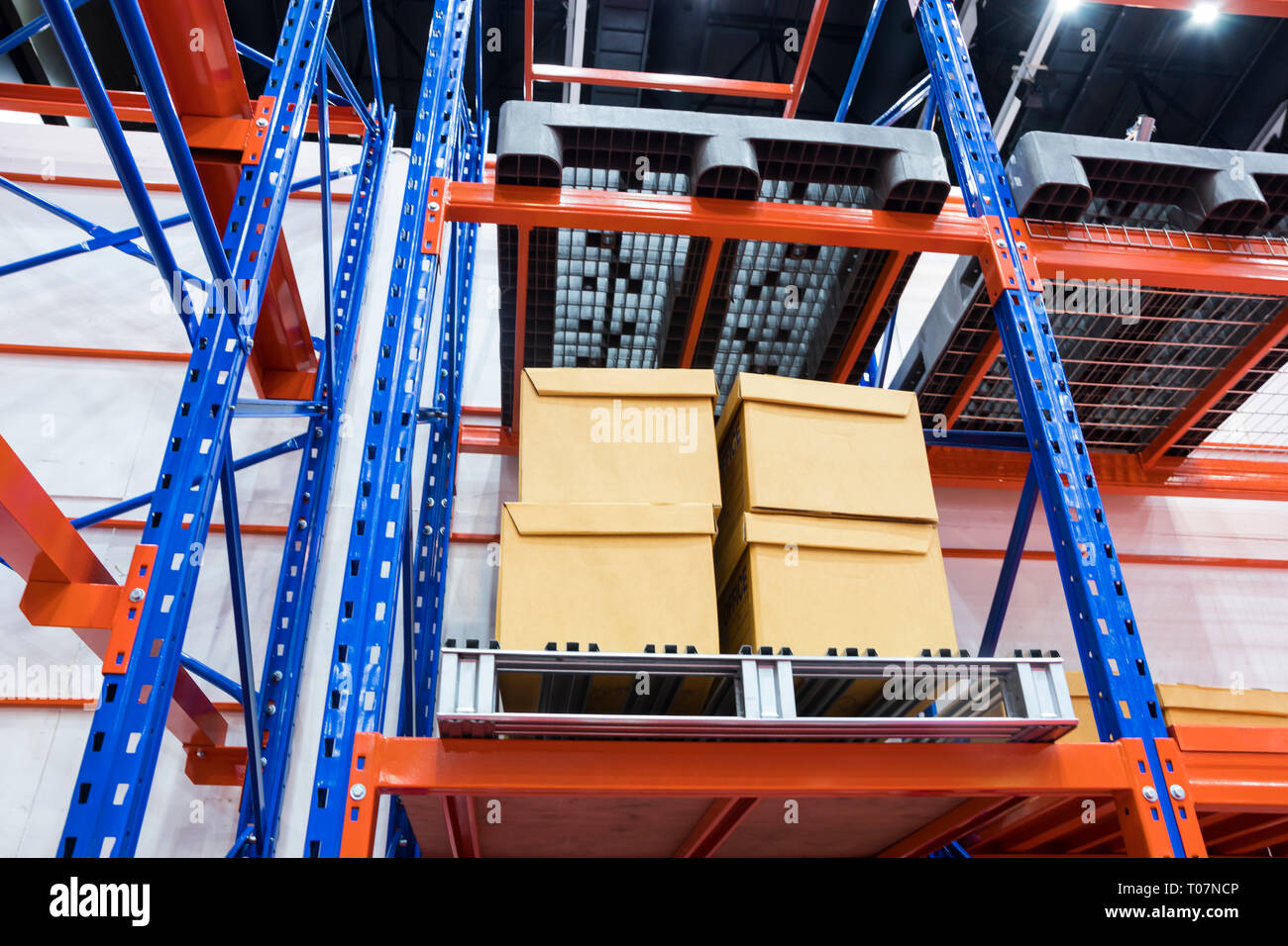 row of cotton boxes kept in warehouse shelves ; logistics Stock Photo ...