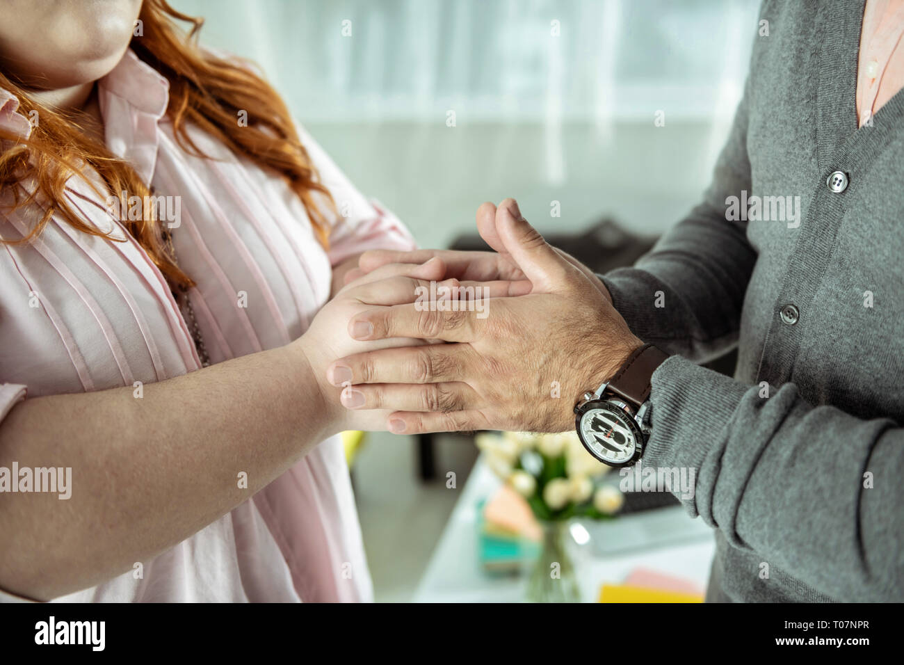 Two people standing close to each other Stock Photo - Alamy
