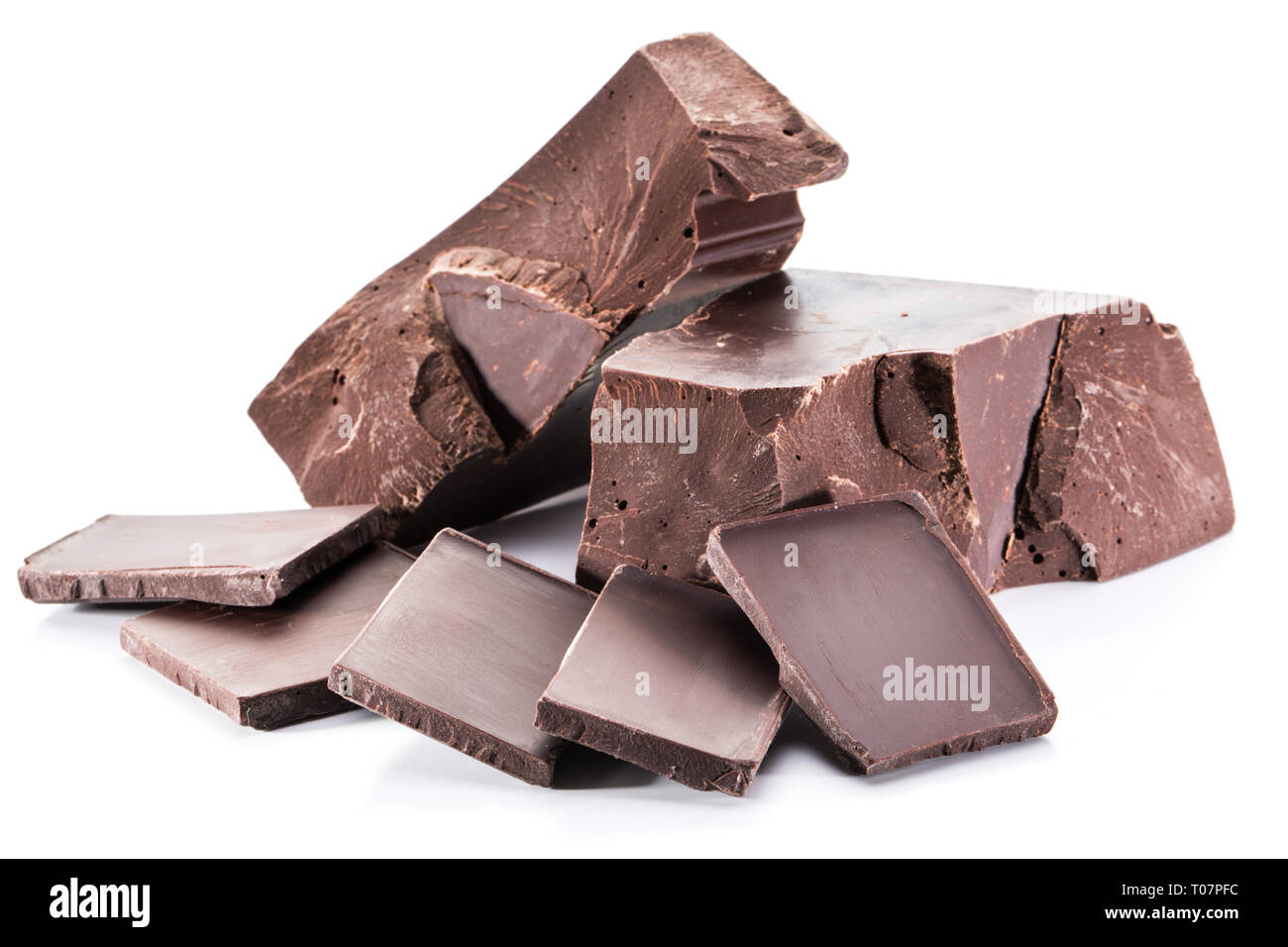 Chocolate blocks and pieces of chocolate bar isolated on a white ...