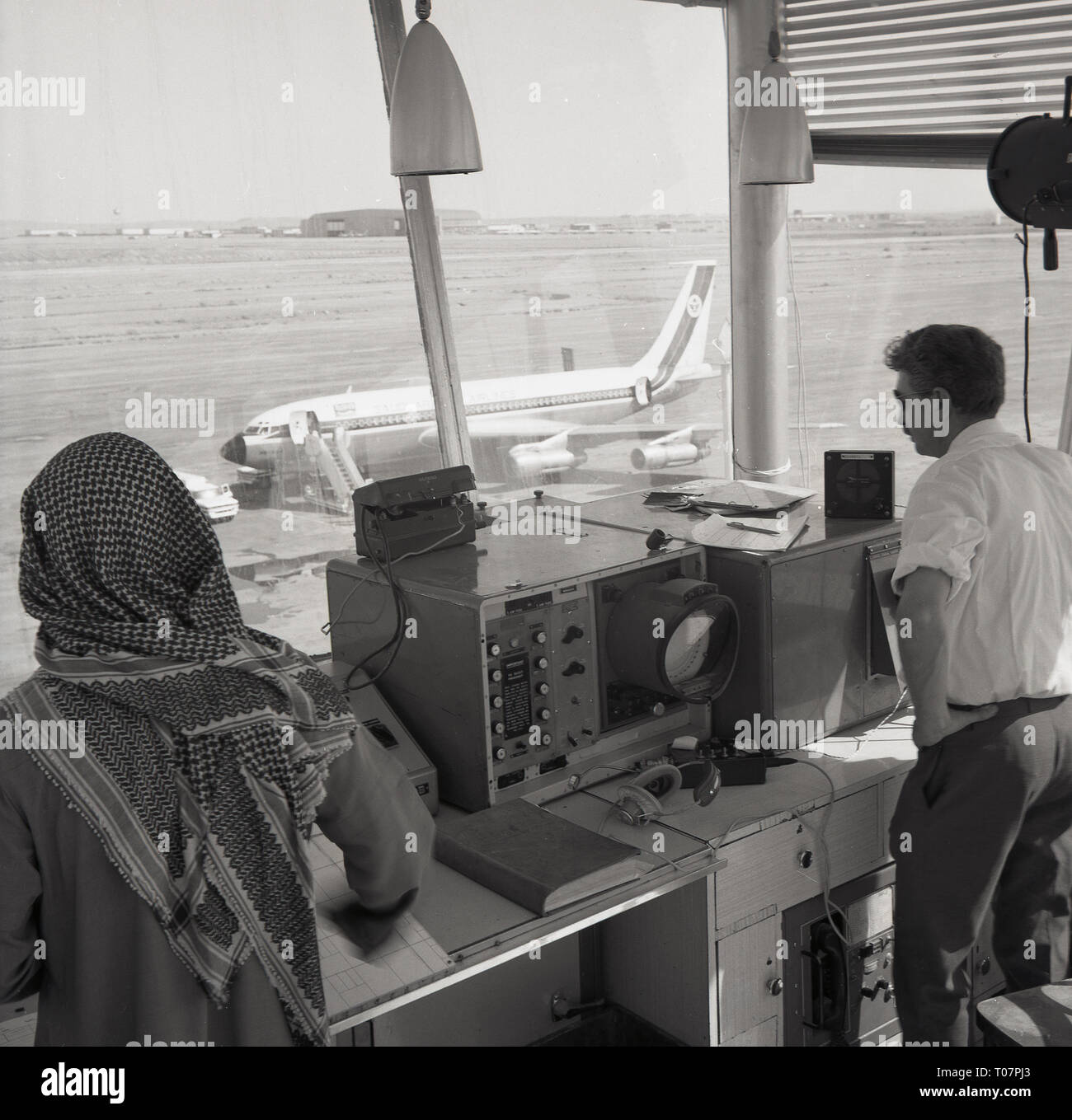 1960s, air traffic control, Riyadh airport, Saudi Arabia, two male ...