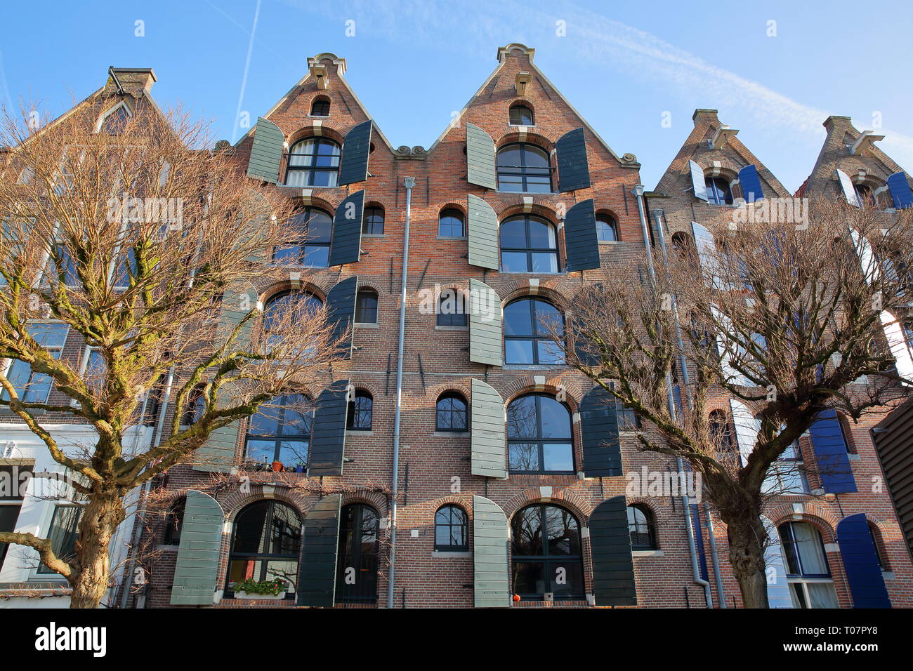 Converted warehouse with colorful window shutters, located in ...