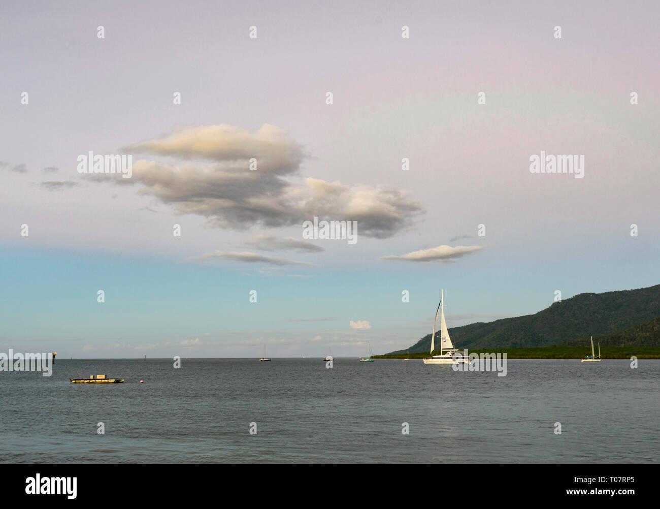 Boat sailing at sunset in Trinity Inlet, Cairns, Far North Queensland ...