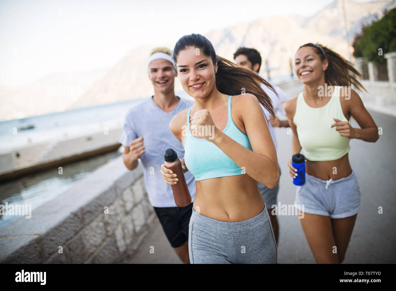 Happy men outside running hi-res stock photography and images - Alamy