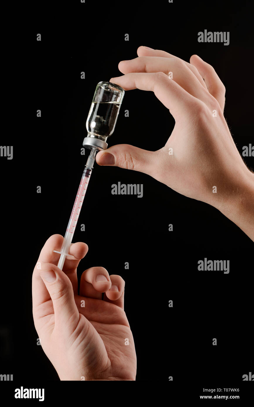 Hands drawing the syringe Stock Photo - Alamy