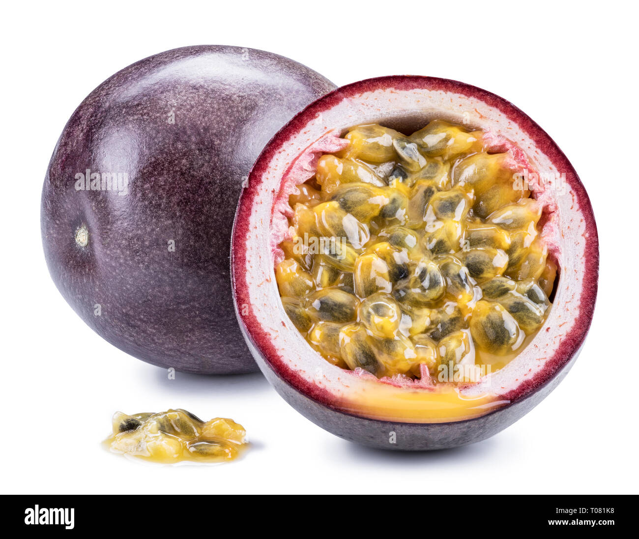 Passion fruit and its cross section with pulpy juice filled with seeds ...