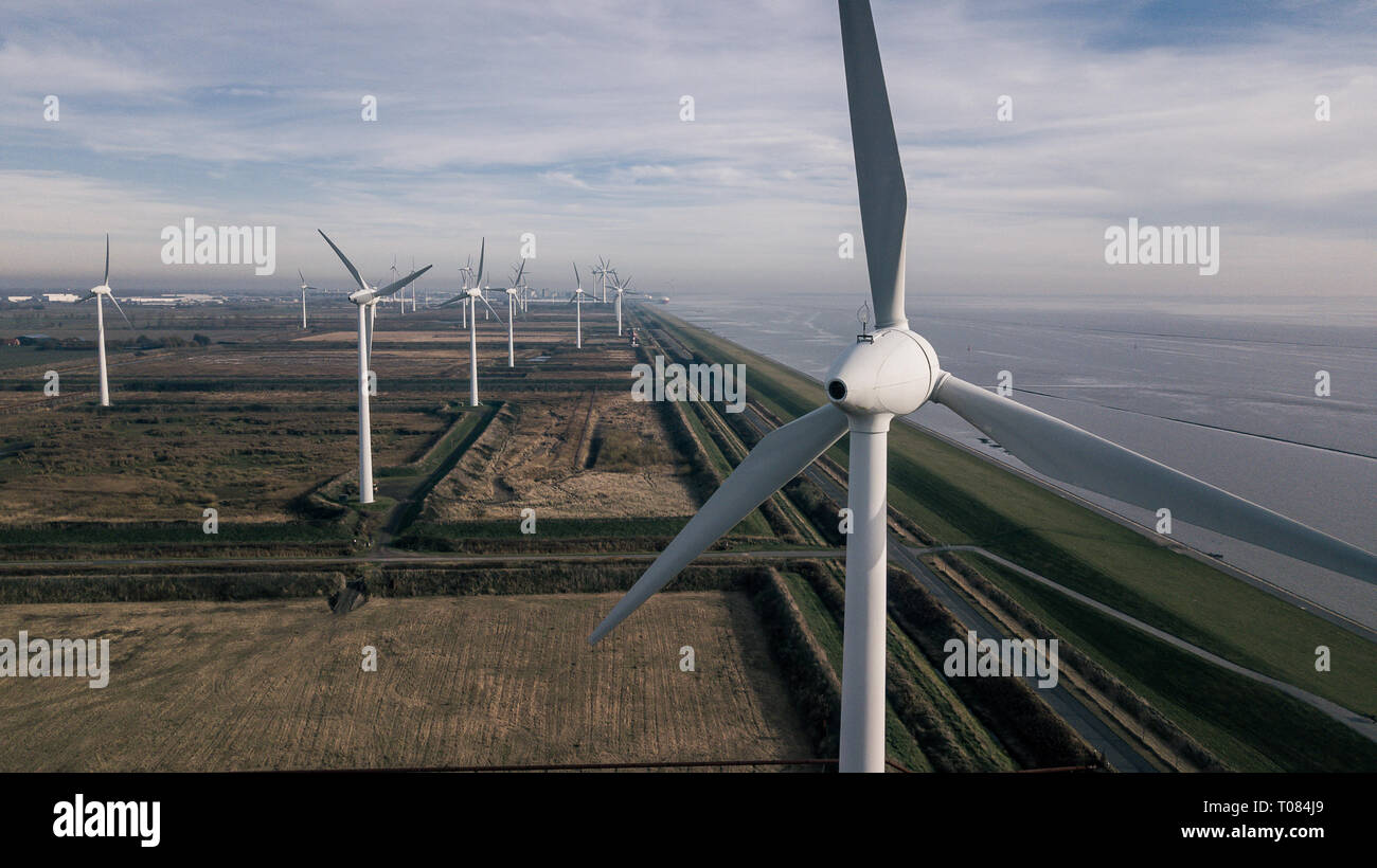 Close to the turbine. Wind turbine from aerial view - Sustainable ...