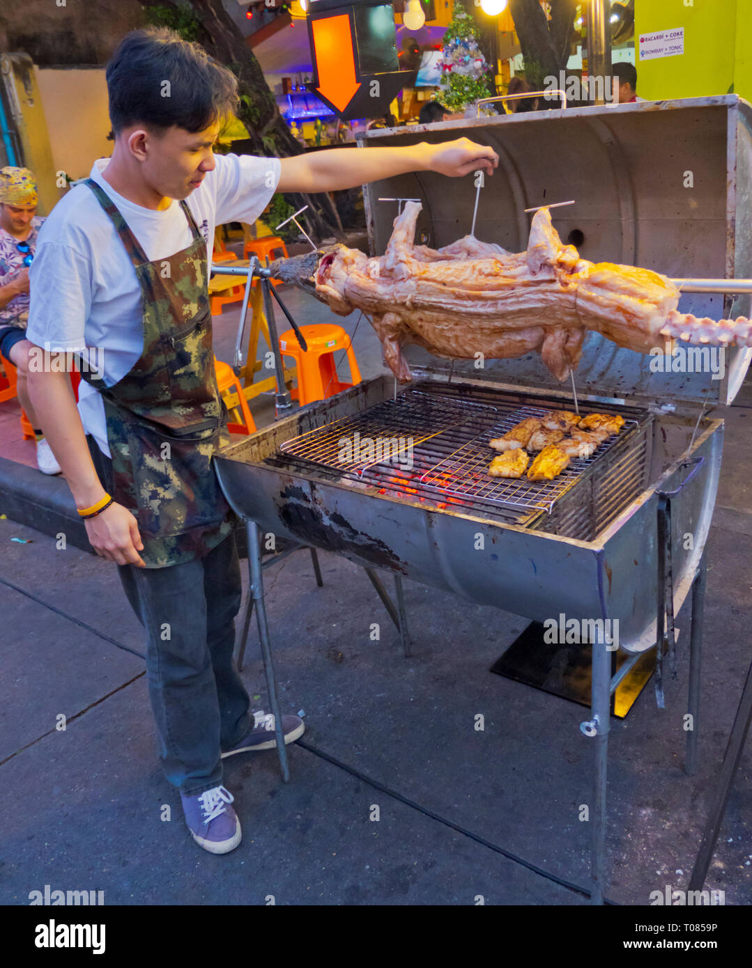 Crocodile grilling, Khaosan Road, Banglamphu, Bangkok, Thailand Stock ...