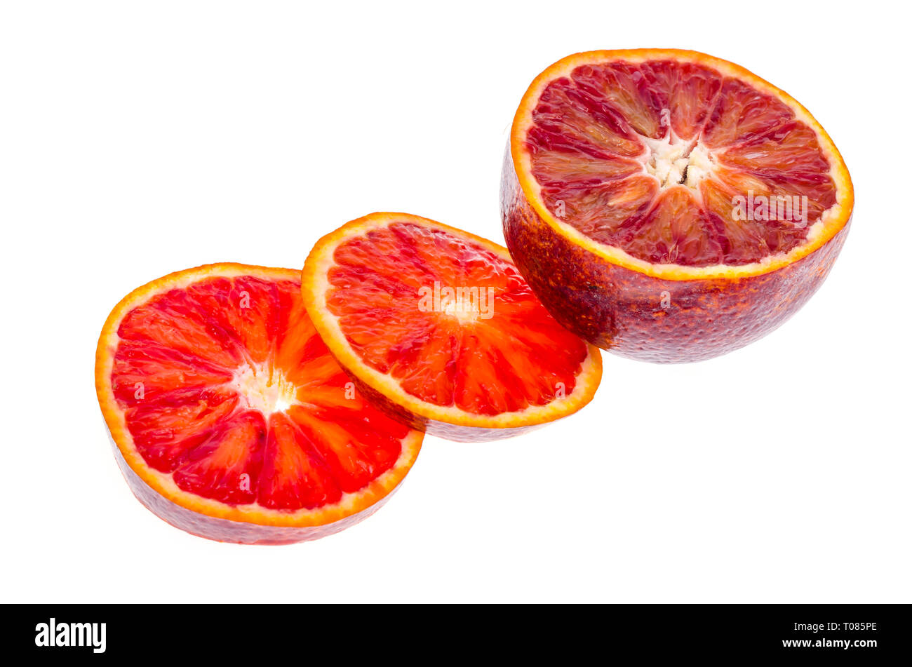 Orange red sweet ripe juicy sliced. Studio Photo Stock Photo - Alamy