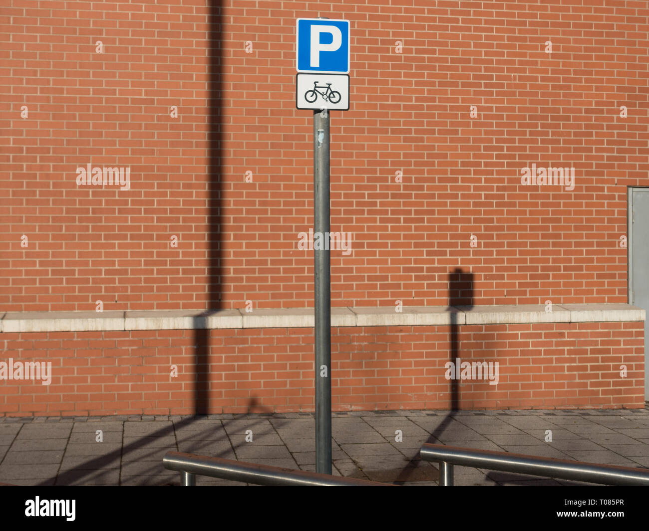 The shadows of road signs Stock Photo - Alamy