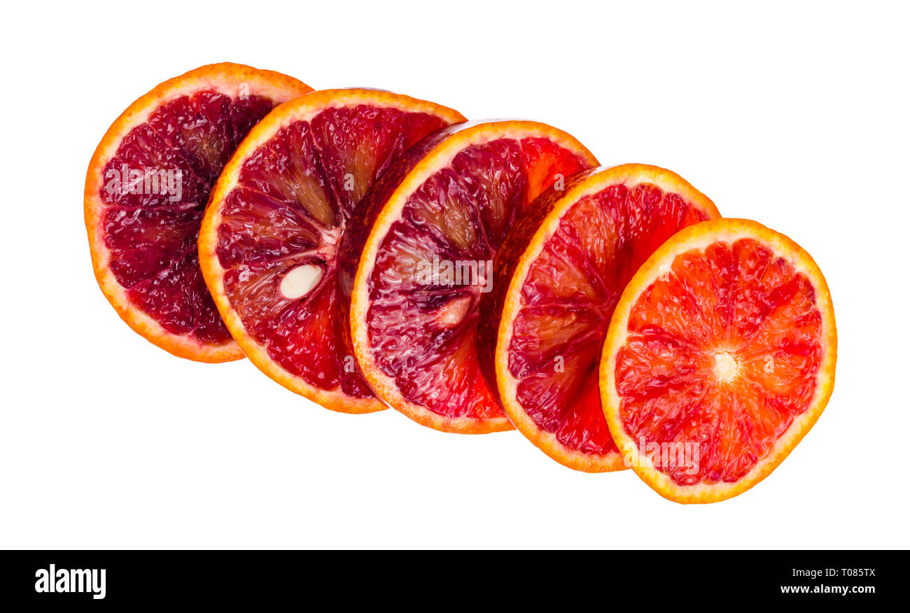 Orange red sweet ripe juicy sliced. Studio Photo Stock Photo - Alamy