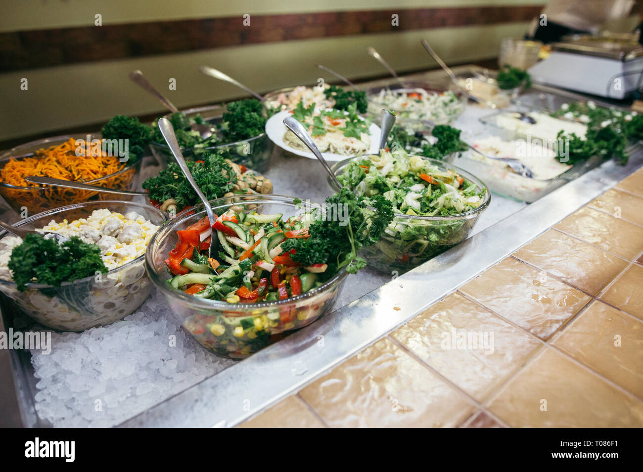 Greek food background. Greek salad, assortment of feta, olives and ...