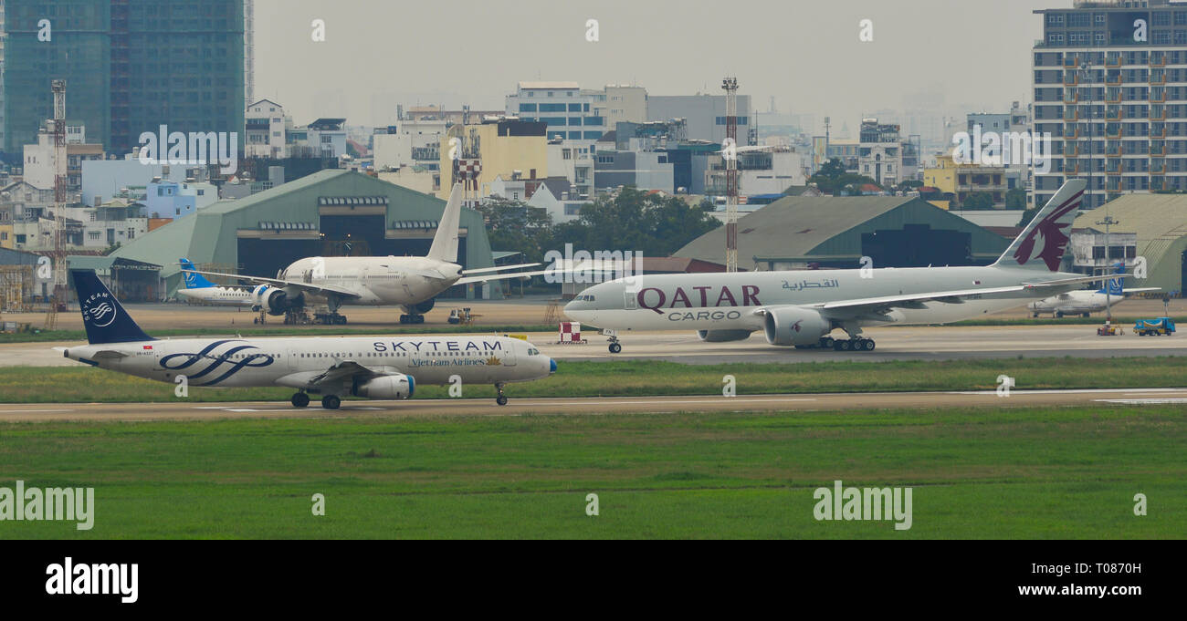 Saigon, Vietnam - Nov 18, 2018. Passenger airplanes taxiing on runway ...