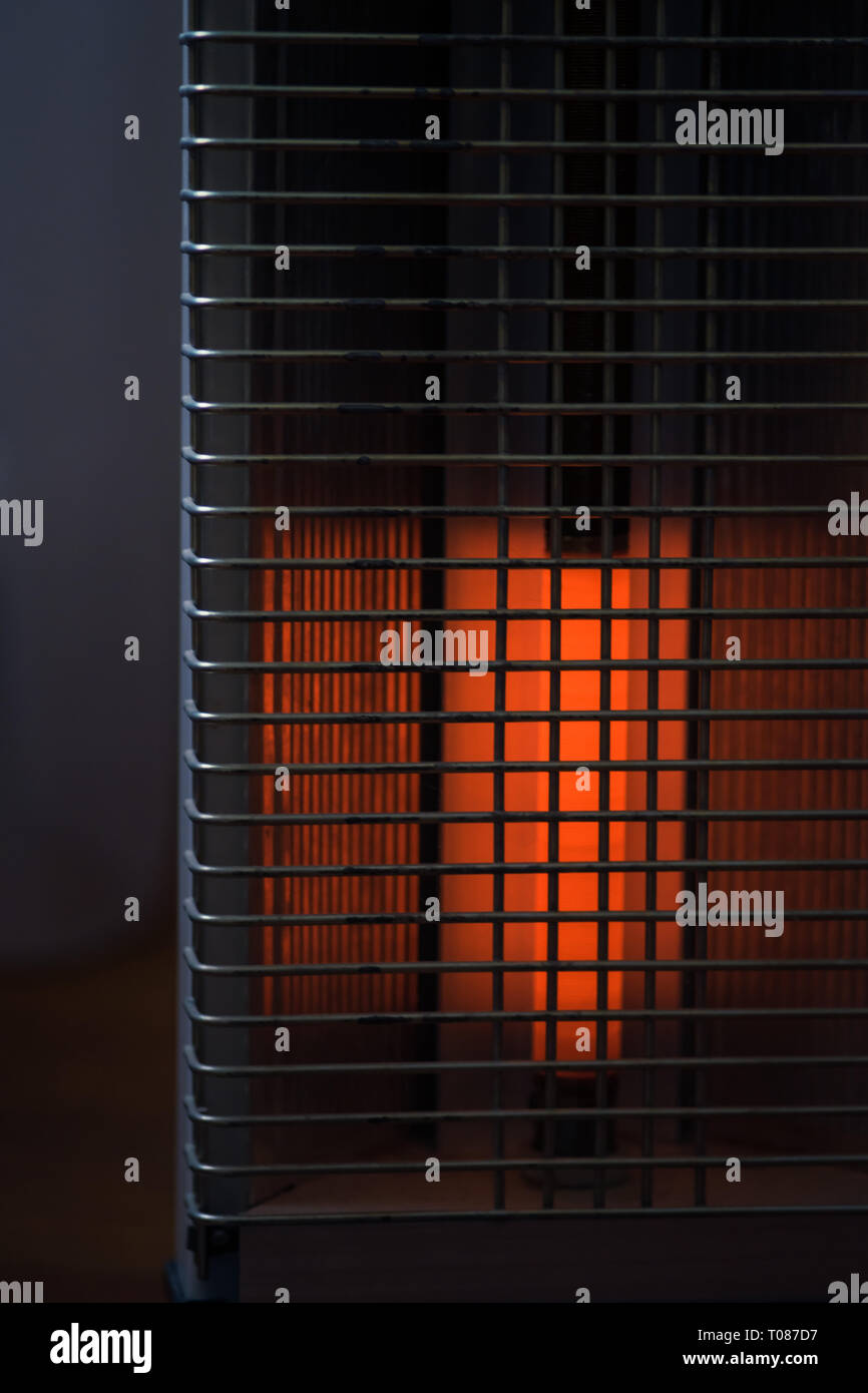 Vintage electric heater Ugolek with a burning lamp rod Stock Photo - Alamy