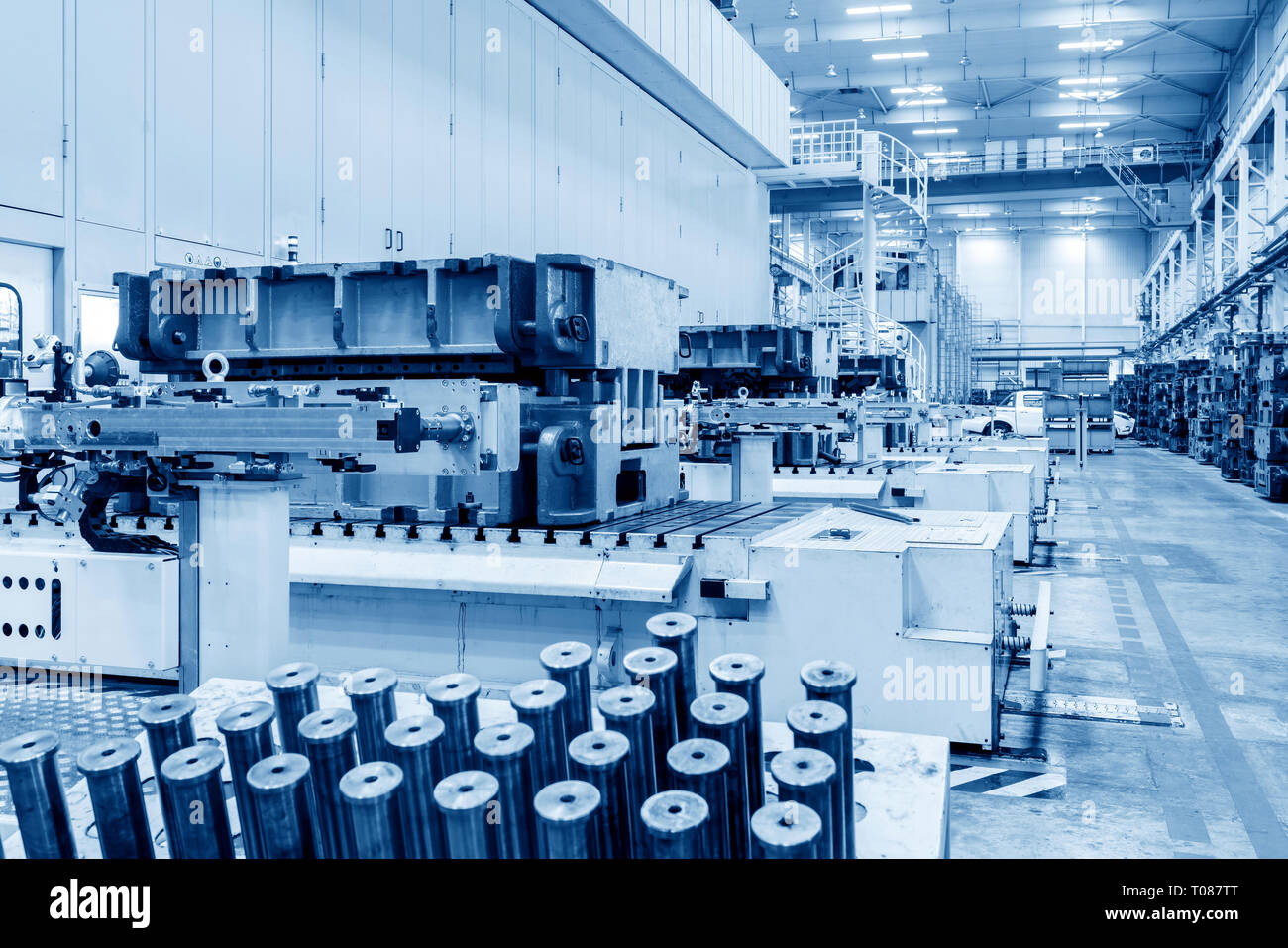The interior of a big industrial building or factory with steel ...