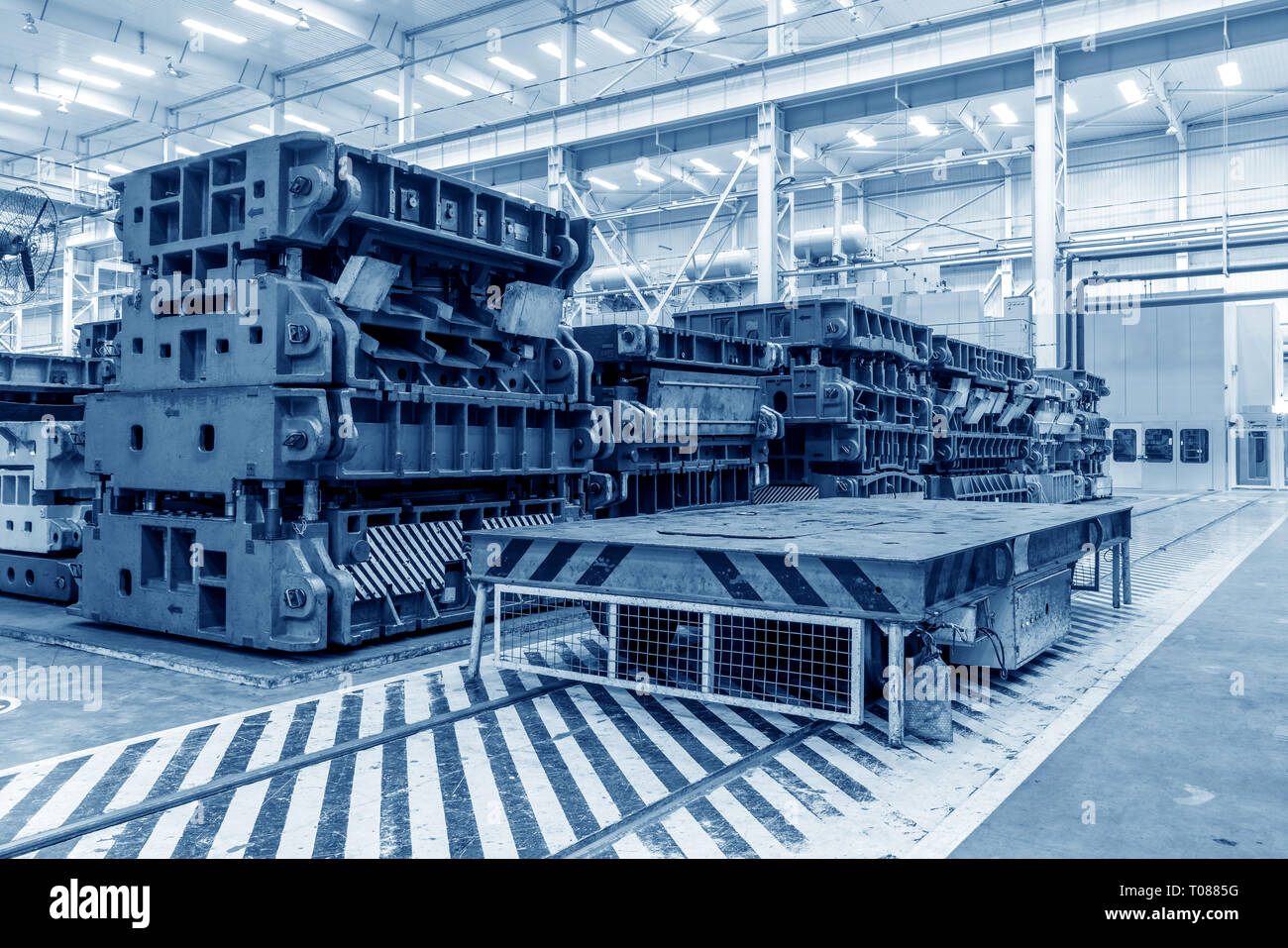 The interior of a big industrial building or factory with steel ...