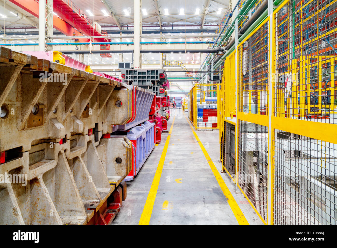 The interior of a big industrial building or factory with steel ...